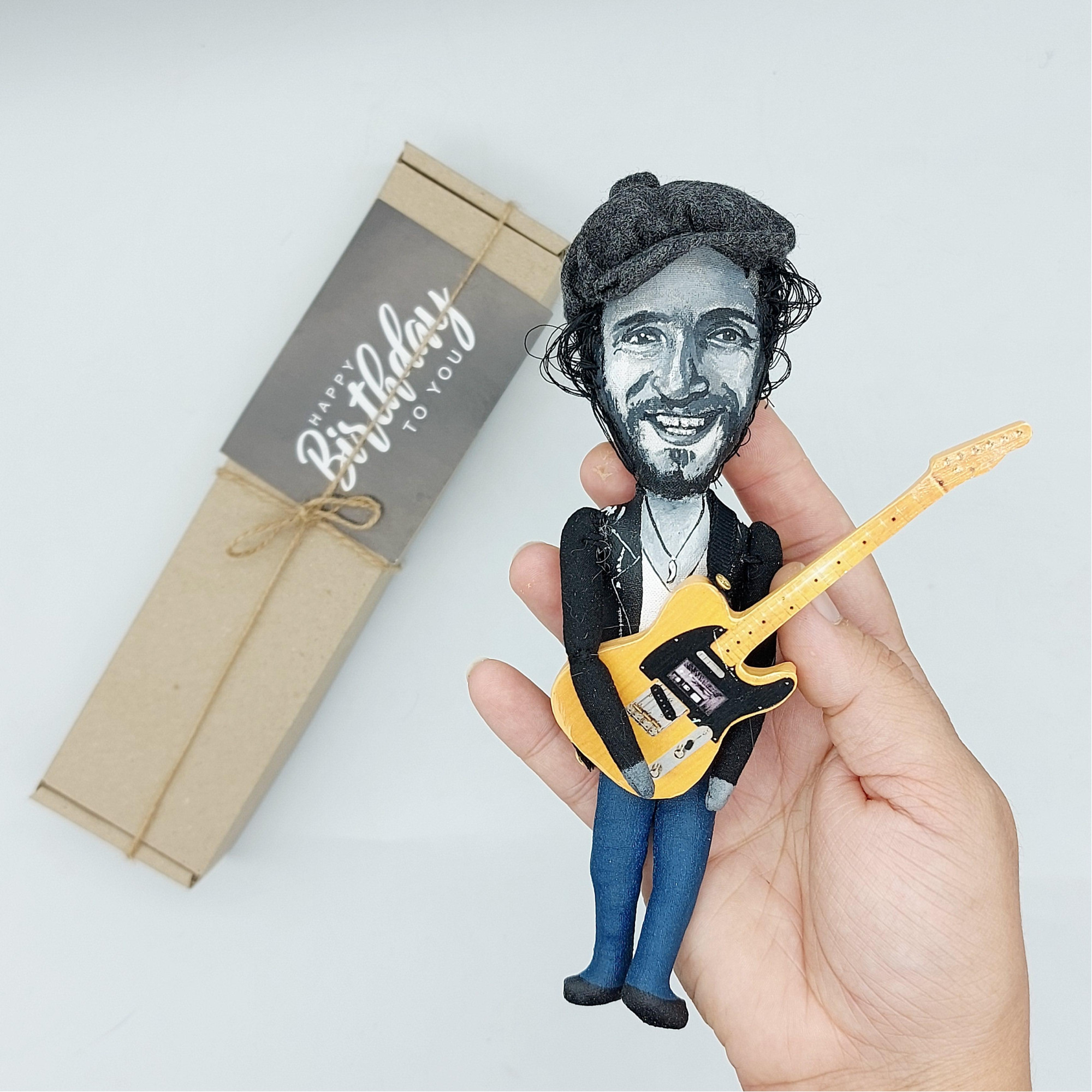 Bruce Springsteen figurine, famous American singer, songwriter ...