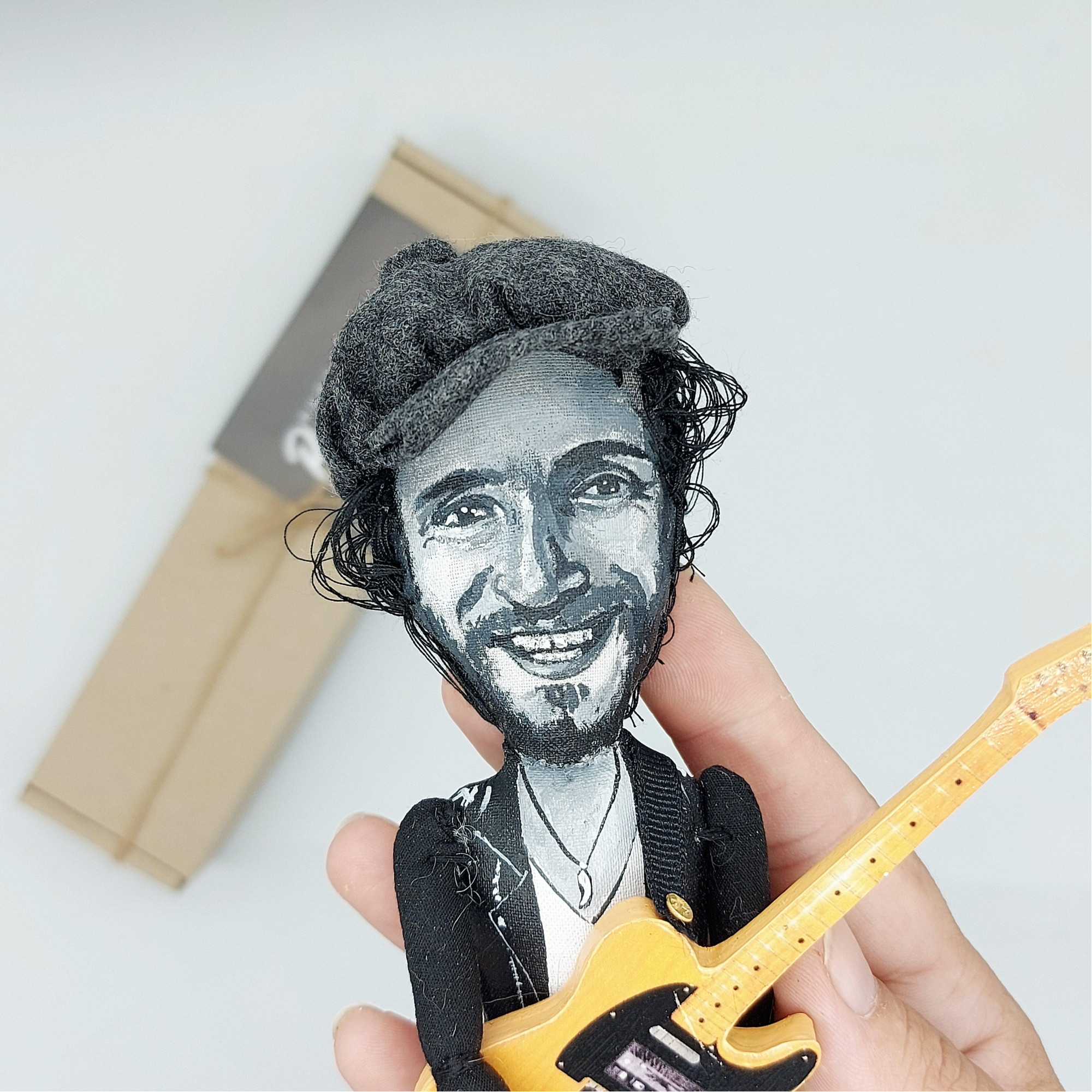 Bruce Springsteen figurine, famous American singer, songwriter ...