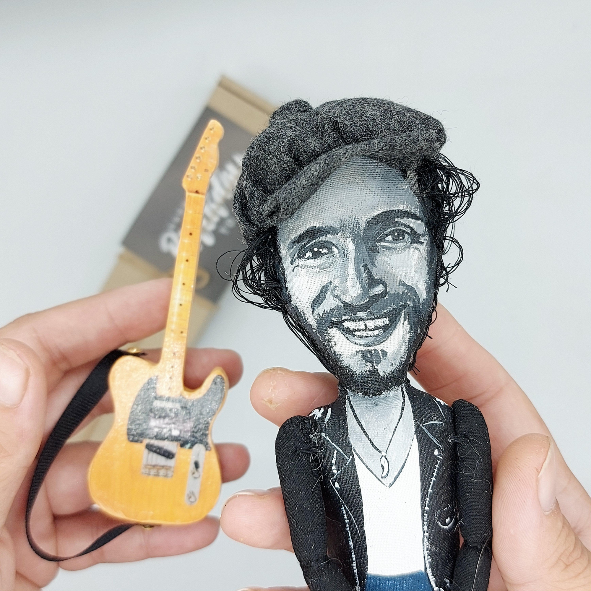 Bruce Springsteen figurine, famous American singer, songwriter ...